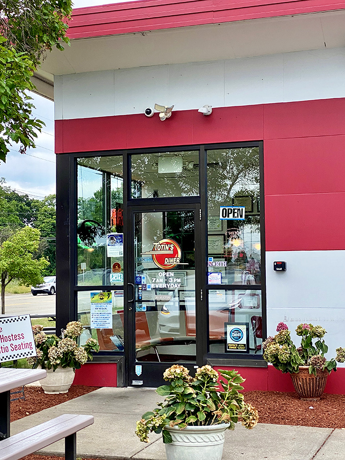 The entrance promises what awaits inside&mdash;classic diner fare in a setting that respects tradition. That "OPEN" sign never looked so inviting.