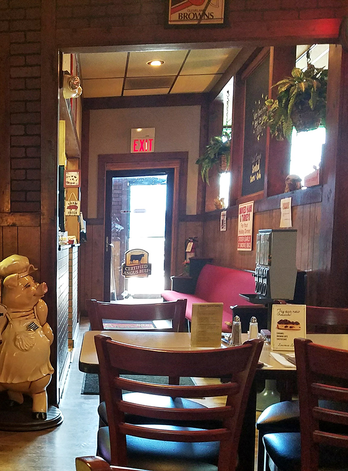 Warm wood tones and homey touches make you feel like you've stumbled into BBQ heaven. Even the exit sign seems reluctant to let you leave.