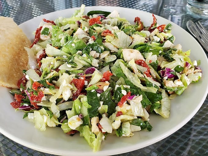 This isn't just a salad; it's a Mediterranean vacation for your taste buds, with crisp greens, vibrant red peppers, and feta cheese playing the starring roles.