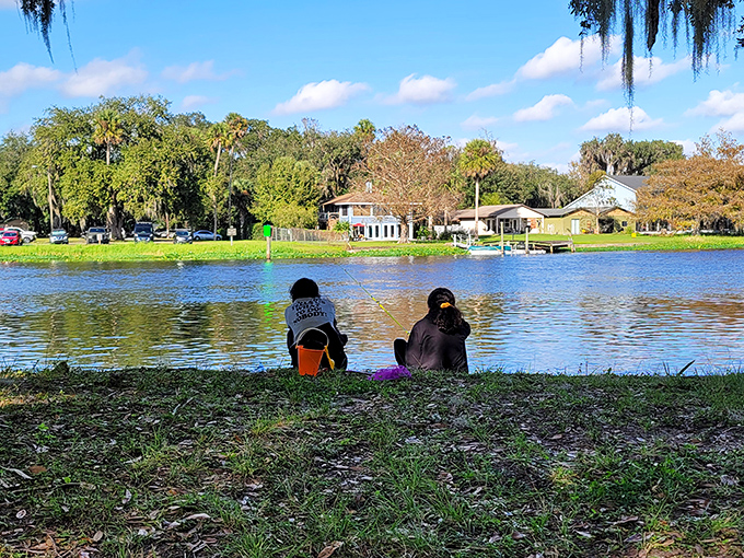 Riverside contemplation: where fishing becomes less about catching dinner and more about catching your breath from everyday life.