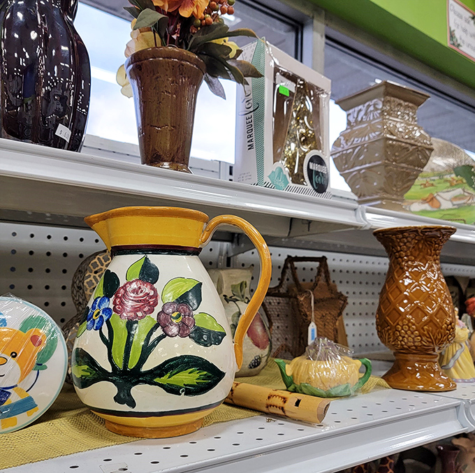 Hand-painted pottery and vintage vases line the shelves &ndash; each piece whispering stories of dinner parties past.