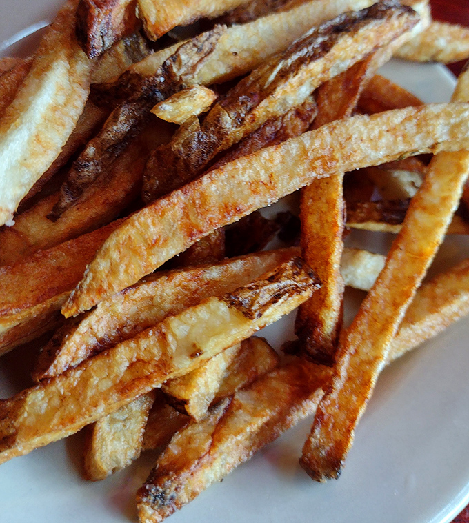 These aren't just french fries&mdash;they're golden potato wands of happiness with perfectly crisp exteriors and fluffy insides. The kind worth fighting over until the last one disappears.