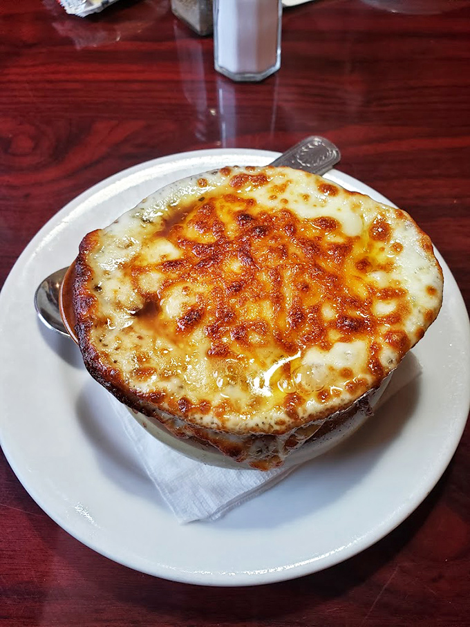 French onion soup that's more cheese than bowl&mdash;a bubbling cauldron of comfort that requires a commitment and possibly a nap afterward.
