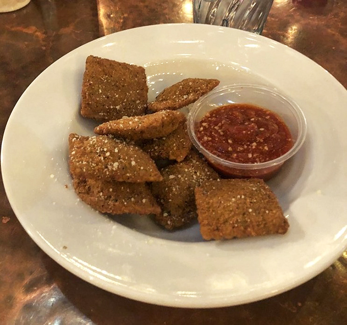 Fried cheese ravioli that makes a compelling case for why Missouri deserves more credit in the culinary world. Crispy, golden pillows of joy served with marinara for dunking.
