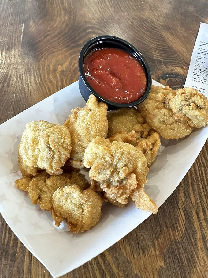 These aren't just fried oysters&mdash;they're little cornmeal-crusted miracles. Dip one in that marinara and tell me you don't believe in love at first bite.
