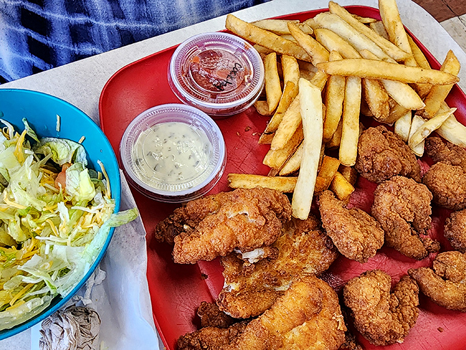 A platter that answers the eternal question: "What would I eat if calories were just a rumor?" Crispy shrimp, golden fries, and fresh slaw—the holy trinity.