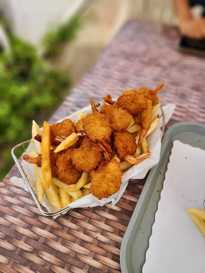 These golden-fried shrimp aren't just appetizers—they're little crispy miracles from the deep. The perfect balance of crunch and tender sweetness.