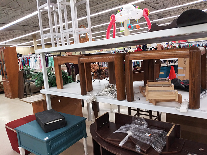 Tables and shelves in various states of dignity, waiting for someone to see past the scratches to possibility.
