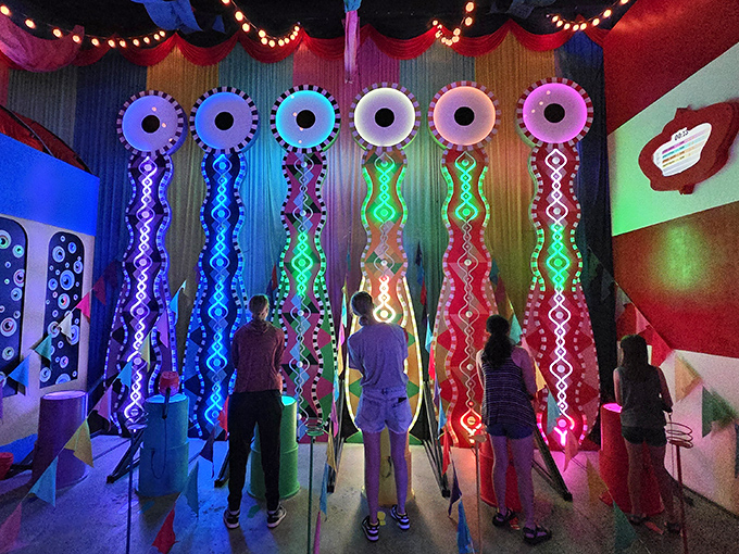 Interactive light towers invite visitors to conduct a symphony of color with just the wave of a hand.