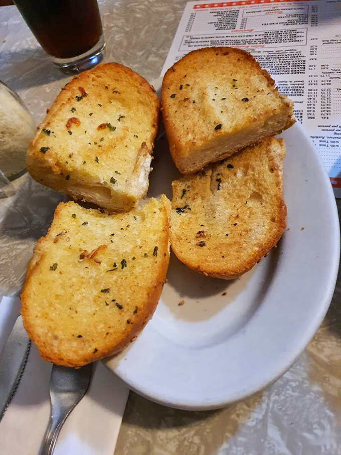 Garlic bread that doesn't whisper its presence&mdash;it announces itself with golden, buttery authority and enough garlic to keep vampires at bay for centuries.