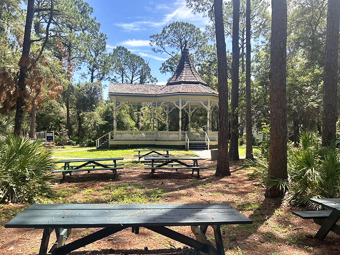 The gazebo stands like a Victorian-era Instagram backdrop, surrounded by picnic tables where visitors can rest their feet and imagine Sunday band concerts of yesteryear.