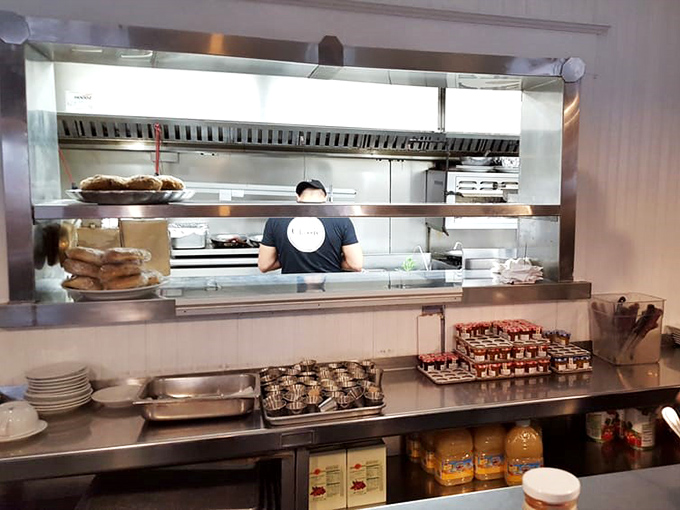 The open kitchen window: dinner theater where spatulas are the stars and eggs get standing ovations.