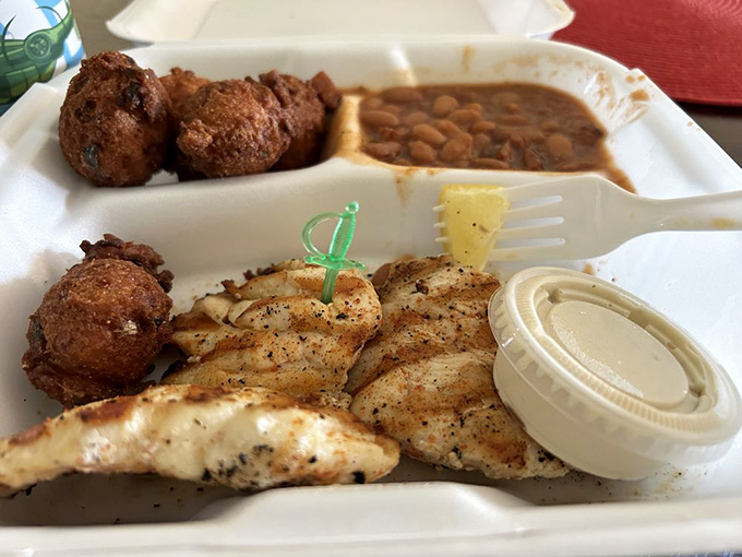 Simplicity at its finest &ndash; perfectly grilled fish with hushpuppies and baked beans proving that sometimes less truly is more.