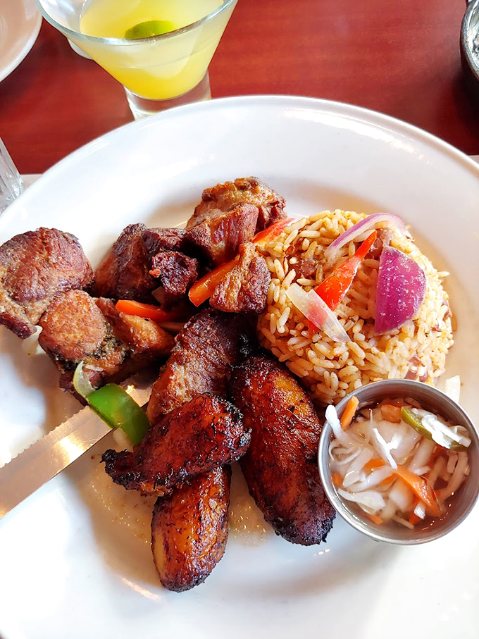 Griyot &ndash; Haiti's gift to your taste buds. These crispy pork morsels with colorful rice could make even the most dedicated health nut temporarily abandon their principles. 