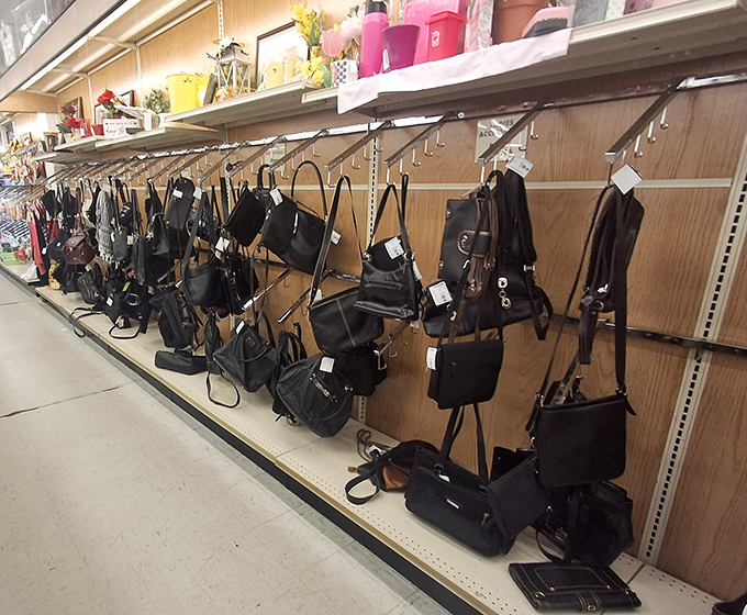 The handbag wall &ndash; where designer dreams meet practical reality, and yesterday's status symbols await their chance to accessorize tomorrow's outfits.