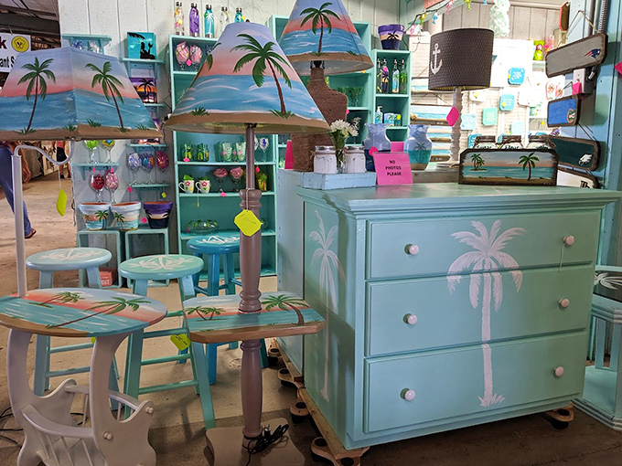 Coastal-themed furniture that screams "Florida living!" These turquoise pieces with palm tree motifs bring the beach vibes indoors year-round.