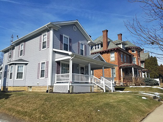 These neighboring homes tell Mount Gilead's architectural story, where Victorian elegance and practical Midwestern sensibility stand side by side as good neighbors.