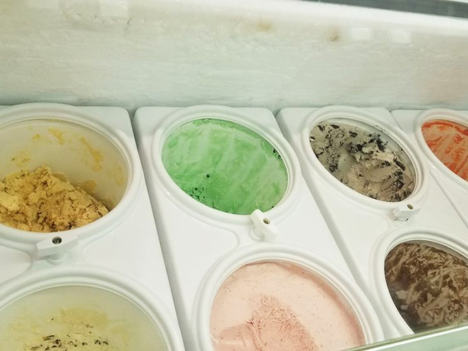 The ice cream case&mdash;where dreams are stored at precisely 10 degrees. Each pastel-colored compartment holds a different path to happiness.