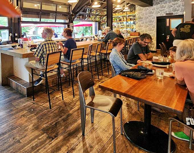 The dining room buzzes with the symphony of satisfied customers—where strangers become temporary neighbors united by the universal language of great food.