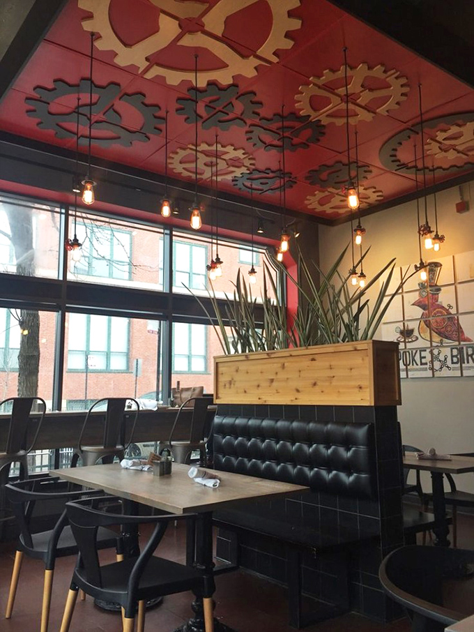 The red ceiling with its mechanical gears suggests you've entered a delicious Willy Wonka factory for grown-ups. No chocolate river, but plenty of culinary magic.