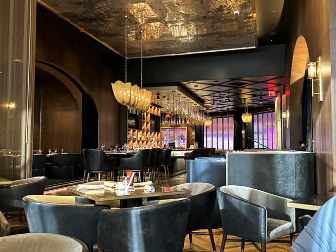 The dining room whispers "special occasion" even on a Tuesday, with lighting designed to make everyone look like movie stars.