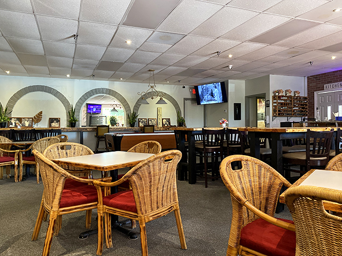 Those archways and wicker chairs create an atmosphere where strangers become friends over shared appetizer recommendations.