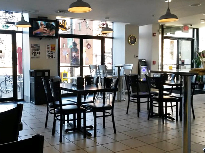 Simple tables, pendant lights, and the promise of satisfaction&mdash;this dining area doesn't need frills when the food delivers the thrills.
