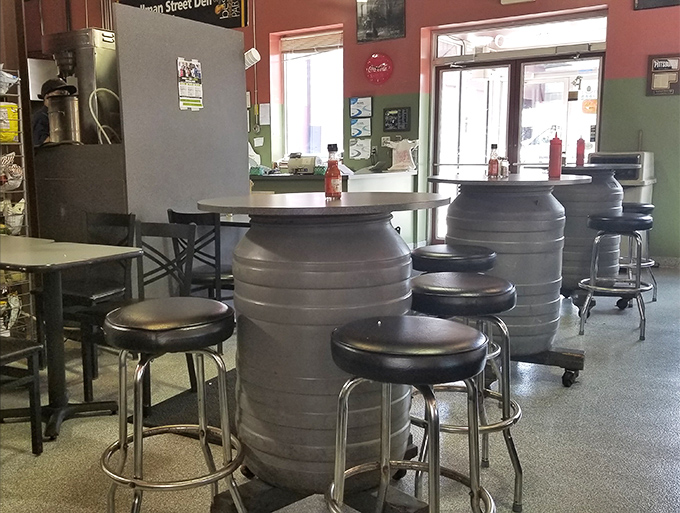 These barrel tables might look industrial, but they've witnessed more moments of food joy than most five-star restaurants.
