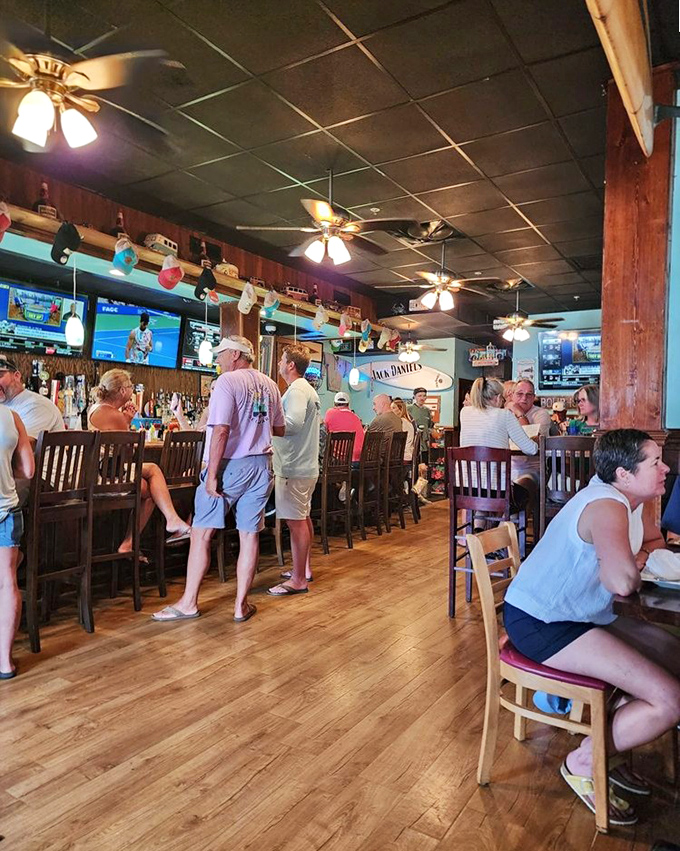 Where locals and tourists find common ground at the bar, united by the universal language of exceptional seafood and cold beer.