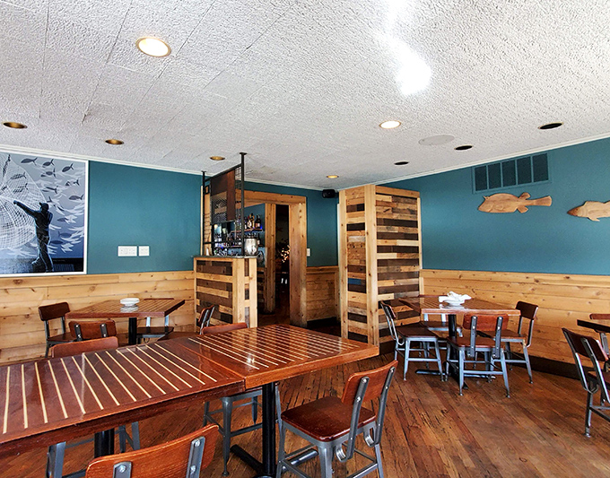 The dining room feels like the captain's quarters of a stylish ship. Wooden tables with nautical stripes say, "Yes, we're serious about seafood."