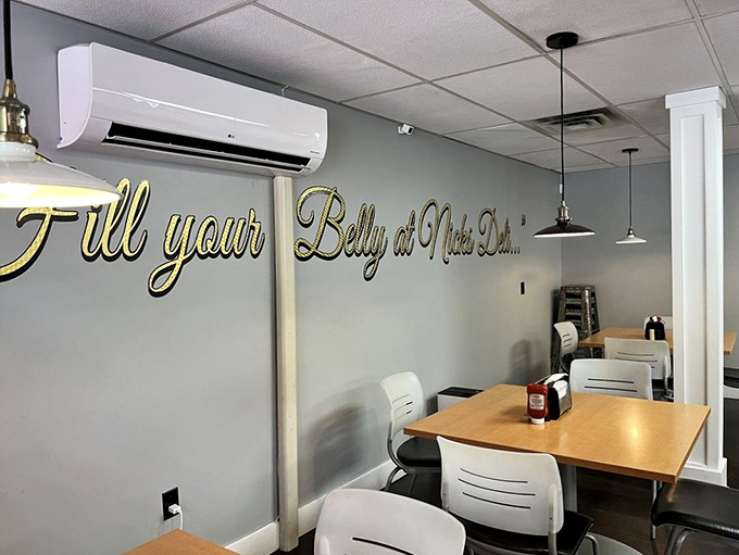 That elegant gold script on the wall isn't just decoration&mdash;it's truth in advertising. The minimalist dining area lets you focus on what matters.