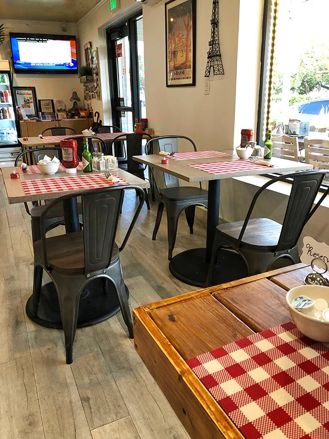 The dining room balances French charm with Florida casual&mdash;Eiffel Tower art on the walls, sunshine streaming through the windows, and zero pretension.