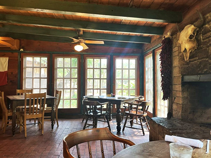 Sunlight streams through windows into a dining room that feels more like your favorite uncle's ranch house than a world-famous restaurant.