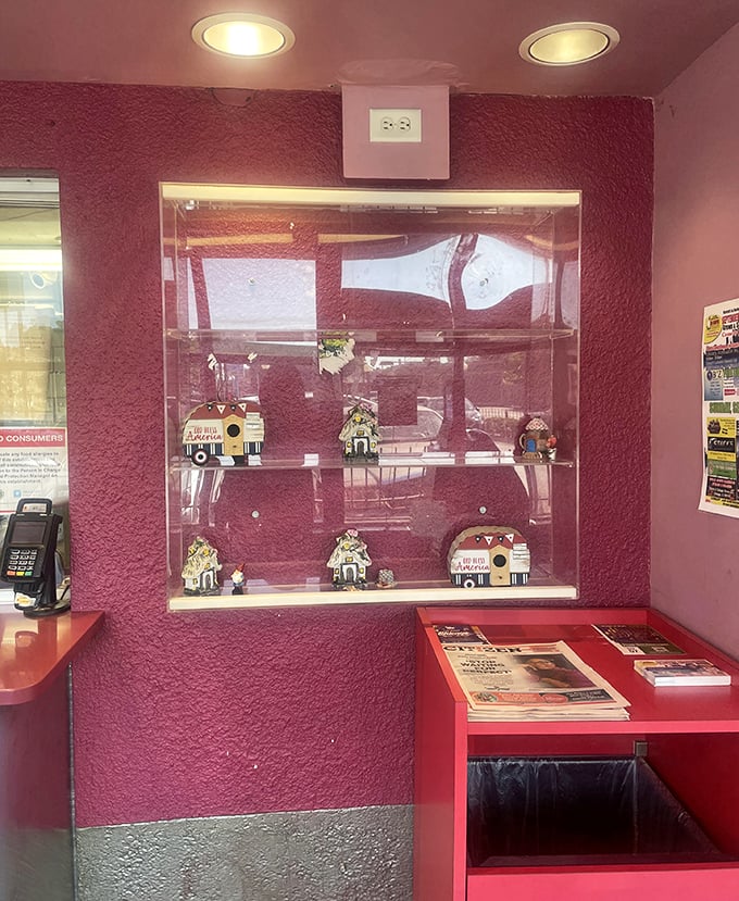 The display case holds tiny treasures, a collection that says, "This place has been here long enough to accumulate character."