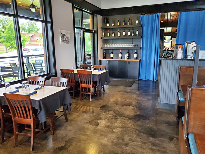 Clean lines, thoughtful design, and wine bottles standing at attention like soldiers guarding the gateway to a good time.