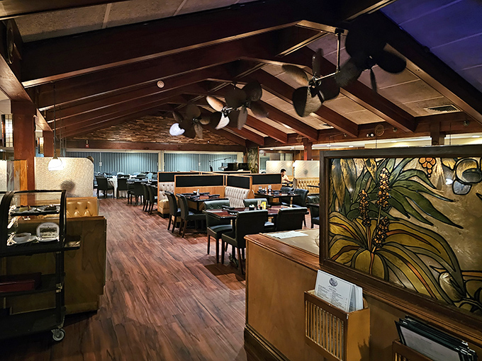 Wood, leather, and stained glass create an atmosphere where dinner feels like an occasion, not just a refueling stop.