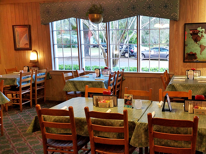The dining room whispers stories of decades of celebrations, with windows framing the coastal light that bathes each table in Southern charm.