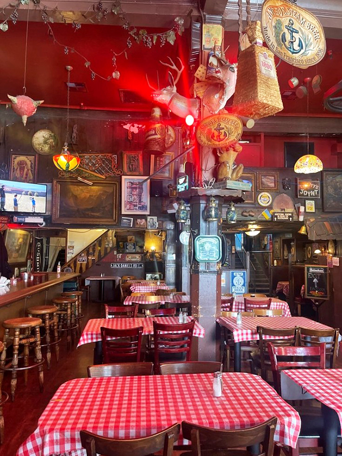 The dining room feels like your eccentric uncle's basement&mdash;if your uncle collected vintage signs, mounted deer heads, and had an uncanny knack for creating cozy chaos.
