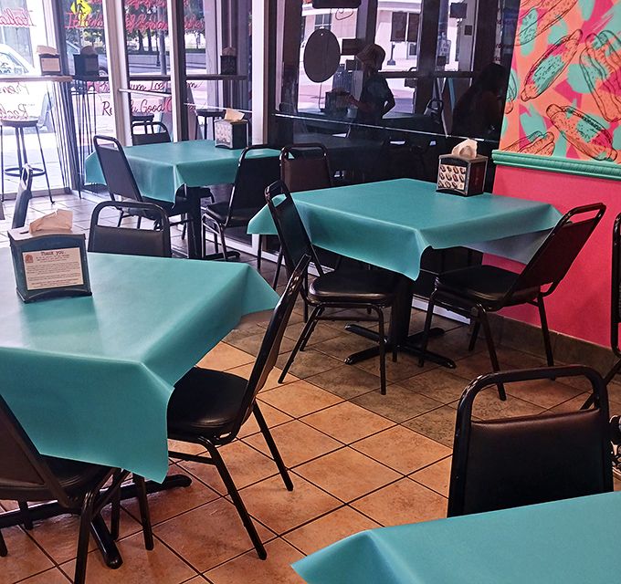 Teal tablecloths add a pop of color that says, "Yes, hot dogs can be served with a side of style."