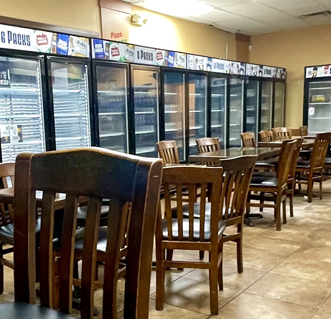 A glimpse into the dining area where countless Pittsburgh pizza pilgrimages have ended in satisfied smiles and empty plates.