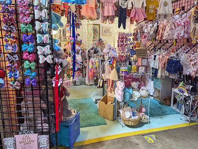 A kaleidoscope of children's clothing and hair bows creates a boutique experience nestled within the market's controlled chaos.