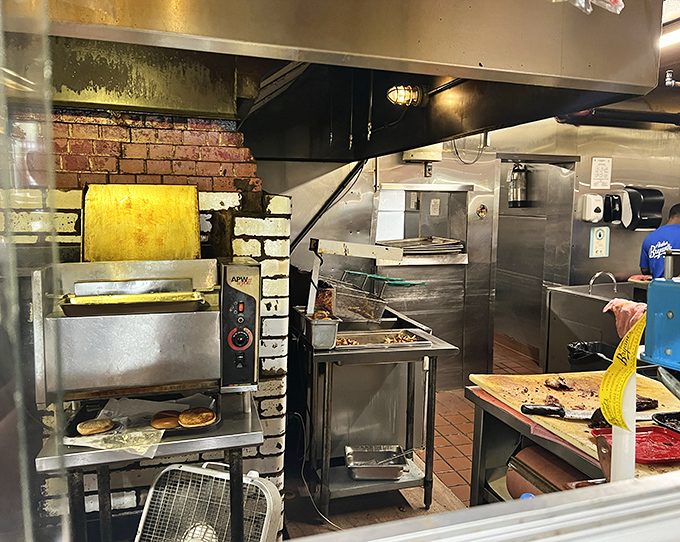 Behind the scenes where the magic happens. Those well-seasoned surfaces have decades of flavor memories baked right in.