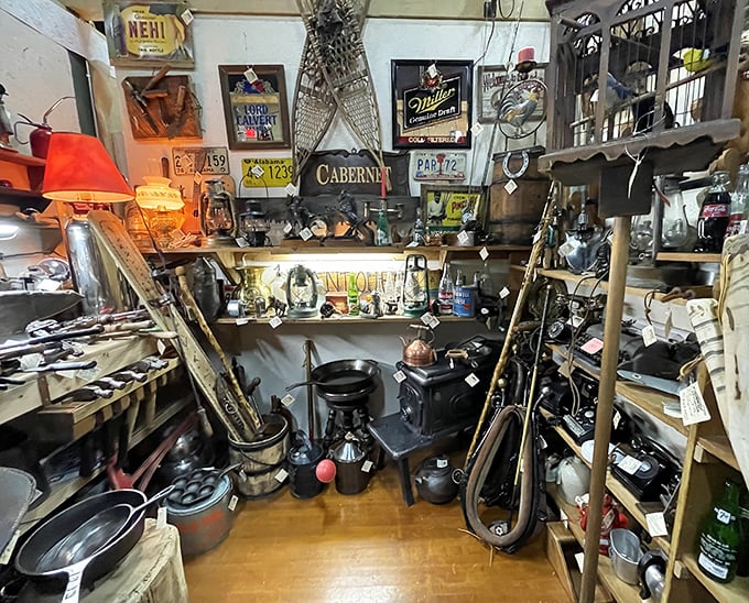 A collector's corner where vintage signs meet cast iron cookware. The kind of nook where you'll find the perfect gift for that impossible-to-shop-for uncle.