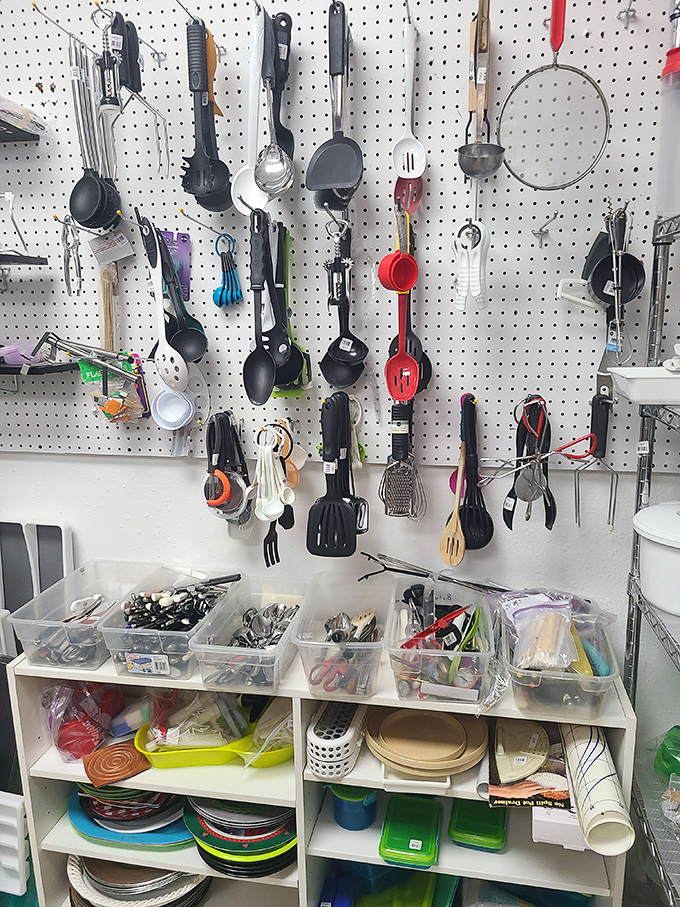 Kitchen utensil paradise! This pegboard of possibilities holds the perfect spatula you never knew you needed until this very moment.