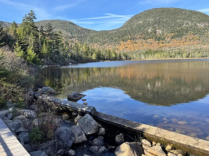 Lonesome Lake isn't lonely at all. The perfect mirror for mountains showing off their good side in this tranquil high-elevation retreat.