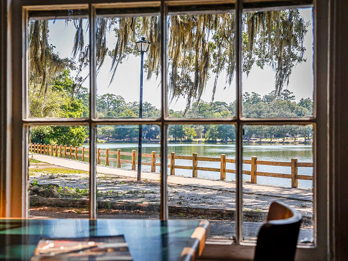 The view through Leon's windows frames Lake Ella like a living watercolor, Spanish moss included at no extra charge.