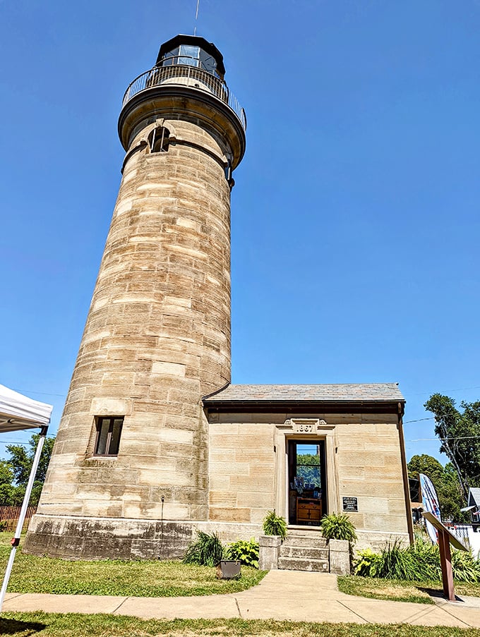 Colorful flowers at the base provide a perfect contrast to the stoic sandstone. Mother Nature adding her decorative touch to human engineering.