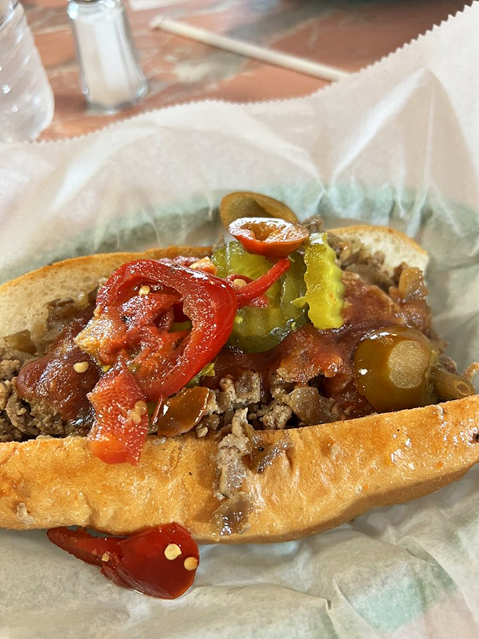 A cheesesteak adorned with hot peppers and pickles&mdash;proof that sometimes the best innovations are the simplest ones. The kind of sandwich that demands both hands.