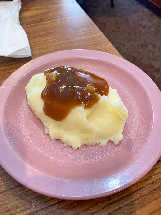 Mashed potatoes wearing gravy like a designer outfit&mdash;simple, elegant, and impossible to improve upon.