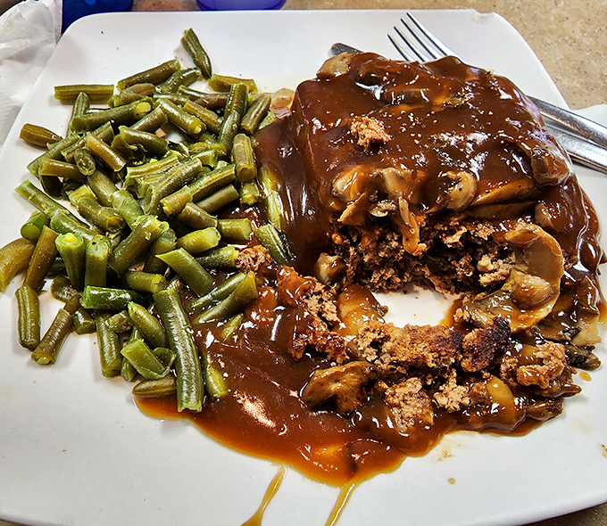Meatloaf that doesn't just remind you of home &ndash; it makes you question why you ever left. Those green beans aren't an afterthought; they're the supporting actor who steals the scene.